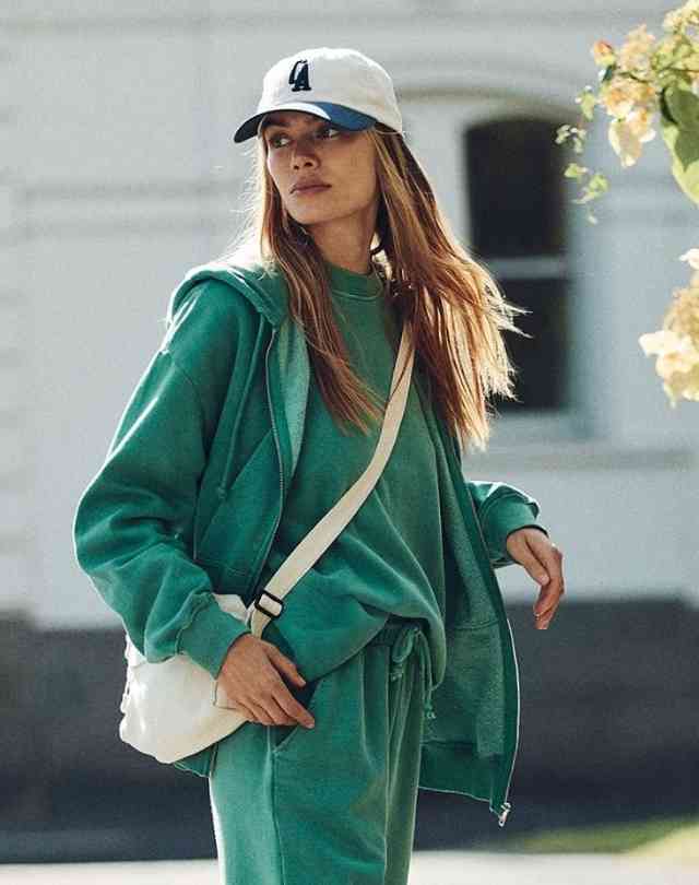 Man walking to a marooned boat