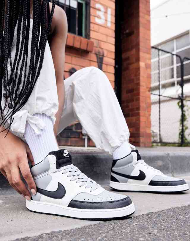 Man walking to a marooned boat