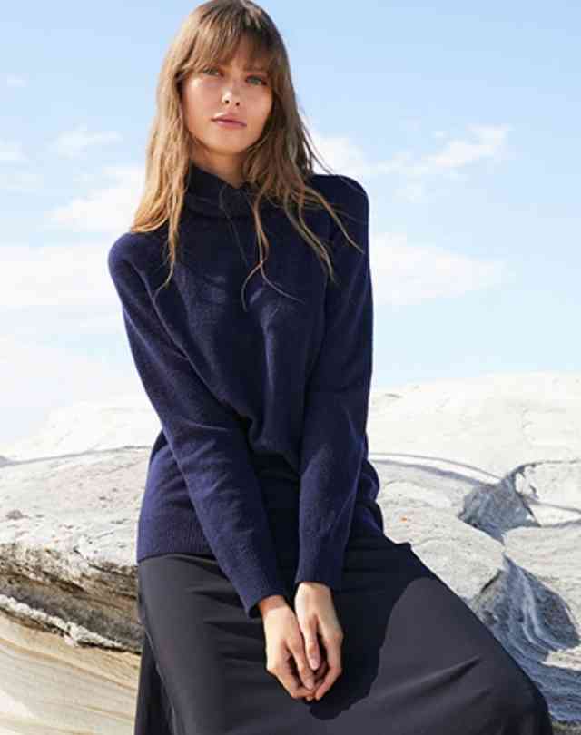 Man walking to a marooned boat